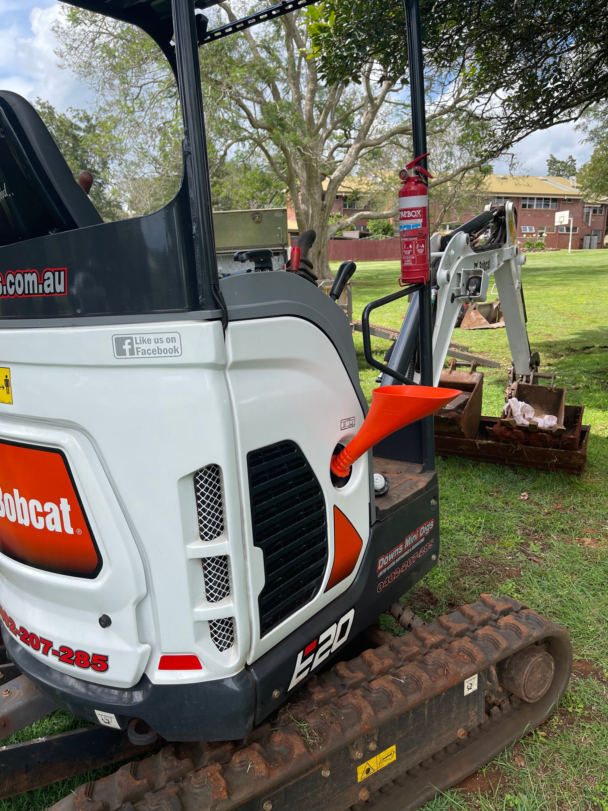 Safety Orange Scrunnel, refueling from jerry cans. Vehicle Funnel car ...